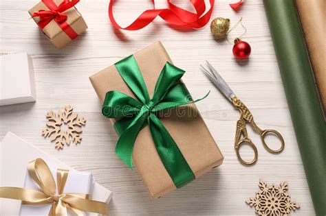 Flat Lay Composition With Beautiful Christmas Gift Boxes And Wrapping
