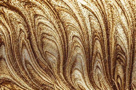 Золотой блеск блестящей текстуры фона Премиум Фото