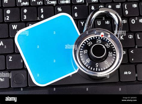 Laptop Computer Keyboard A Number Code Combination Padlock And A Blank