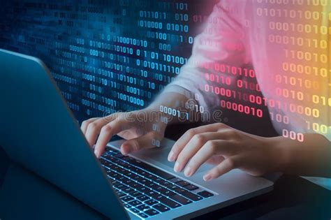 Hands Type On A Laptop With Vibrant Binary Code In The Background Stock