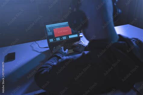 Cybercrime Hacking And Technology Concept Male Hacker In Headphones With Access Denied