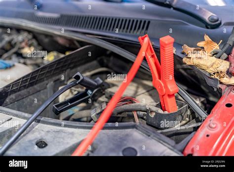 Charging The Car Battery Using Electric Cables Stock Photo Alamy