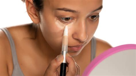 The Internet Is Obsessed With Using Pink Concealer To Brighten Under