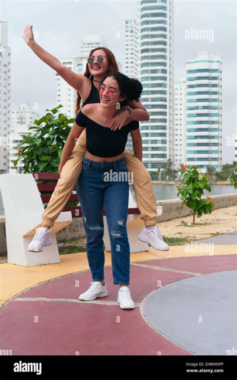 Two Friends Having Fun Outdoors Stock Photo Alamy