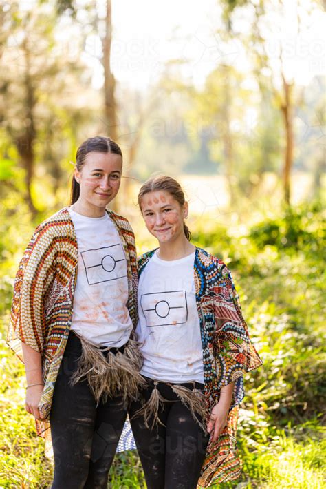 Image Of Portrait Of Two Happy Aboriginal Sisters Together Outside