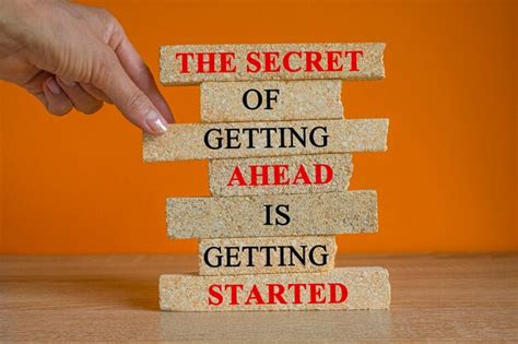 Premium Photo Concept Red Words The Secret Of Getting Ahead Is
