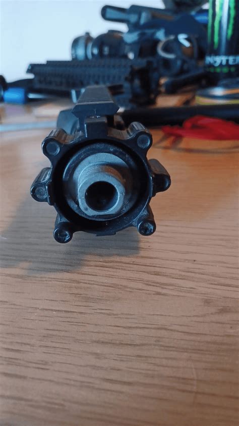 Anyone Know How To Remove The Thingy On The End Of The Upper Rairsoft