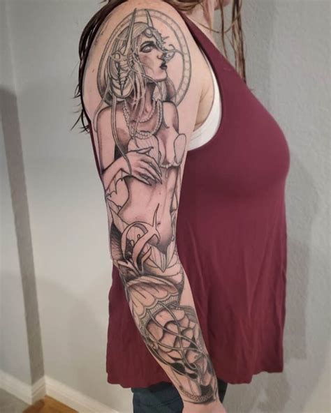 The Symbolism Behind Mermaid Tattoos Self Tattoo