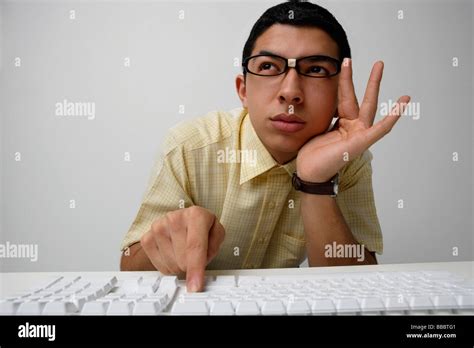 Nerd Working On Keyboard Stock Photo Alamy