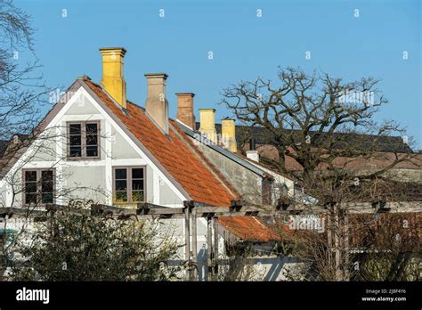 Classic Danish Housing Architecture With Chimneys And Pitched Roofs