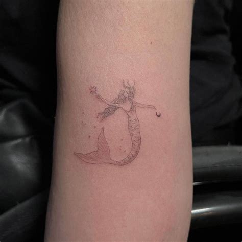 Single Needle Mermaid Tattoo On The Inner Arm
