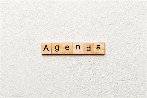 Agenda Word Written On Wood Block Agenda Text On Cement Table For Your Desing Concept Stock
