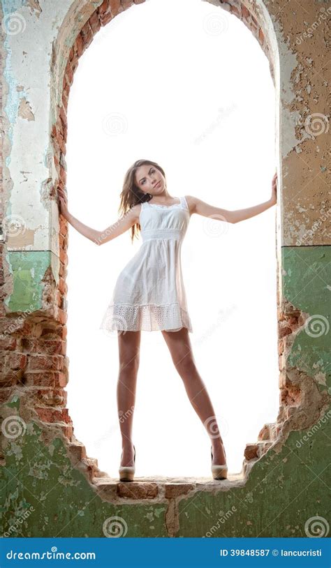 Beautiful Girl Posing Fashion In A Window Frame Stock Image Image Of