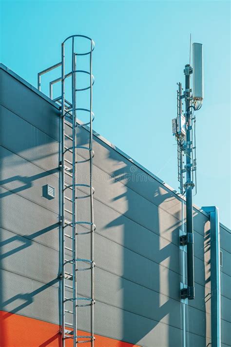 Mobile Telephony Base Station Signal Repeater Antenna On Industrial