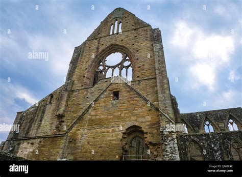 A View Of The Empty Stained Glass Window Frames On A Cloudy Moody