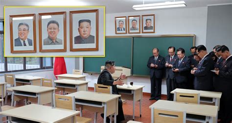Kim Jong Un Displays Portrait Next To Predecessors In Personality Cult