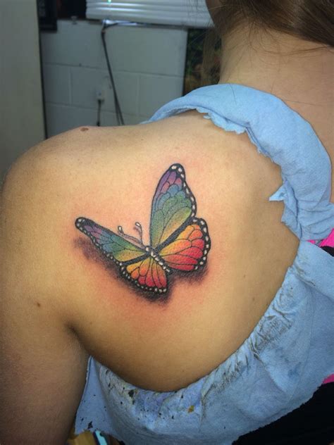 Realistic Rainbow Colored Butterfly Tattoo Done By Ricky Garza In