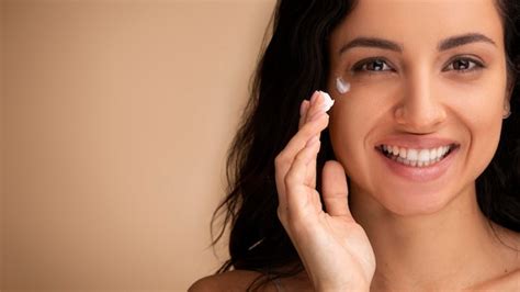 Premium Photo Millennial Woman Applying Eye Cream Copy Space