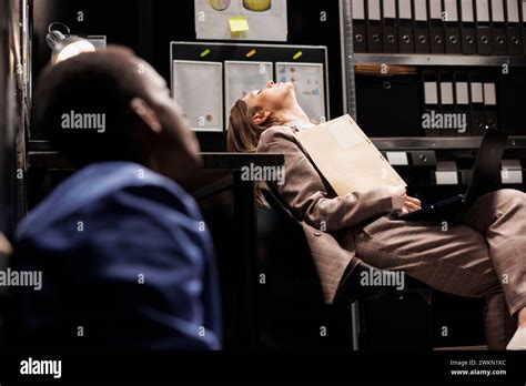 Tired Private Detectives Officers Holding Files With Crime Scene Evidence Analyzing Criminology