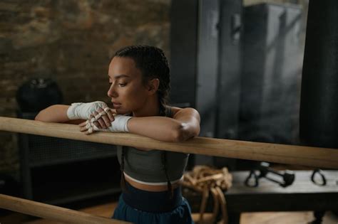 Premium Photo Cropped Closeup Shot Of Hand Connecting Cables To Network Server In Server Room