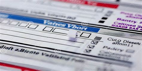 A Close Up Of Forms Or Documents With Checkboxes And Labels For Data Entry Or Organization Stock