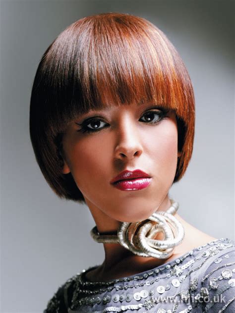 Pastel Pink And Blonde Highlights With Bob And A Full Fringe