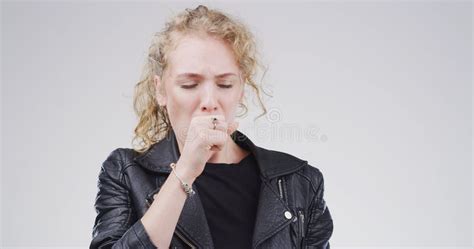 Girl Coughing In Studio And Sick With Health Problem Lung Disease Or