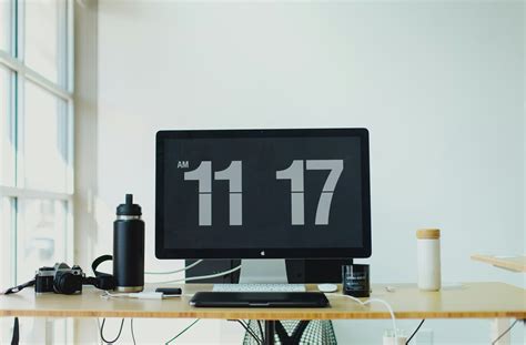 Black Flat Screen Computer Monitor On Brown Wooden Desk Photo Free
