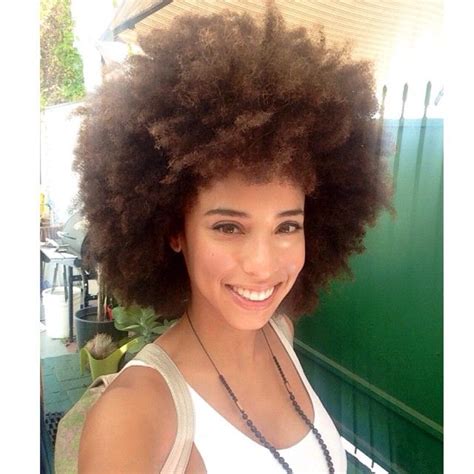 Female Adult Light Skin Brown Hair Brown Eyes Afro Curly Hair