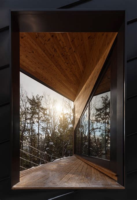 I Kanda Places Angular Cabin Atop Granite Rock In New England