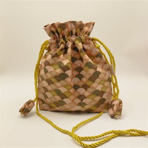 Wemade ХАВРЫН ХЯМДРАЛ 🎉 Үнийн мэдээлэл бүгд орсон 👇 5️⃣Оосортой даавуун цүнх алтан долгиотой