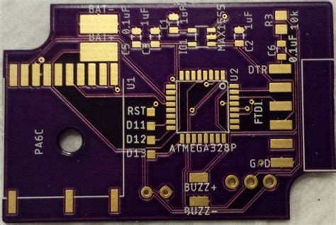Arduino Purple And Gold Printed Circuit Board
