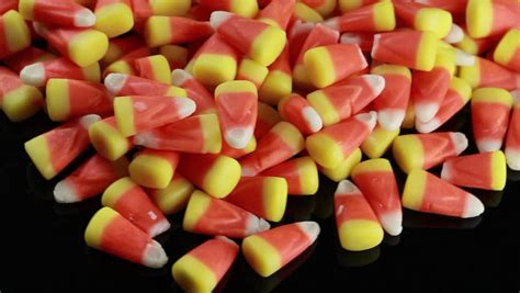Candy Corn Rotating On Black Mirror Stock Footage Video 100 Royalty Free 2878015 Shutterstock