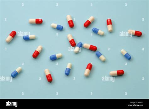 Two Types Of Antibiotics Amoxicillin And Oxacillin Over Blue Background Stock Photo Alamy