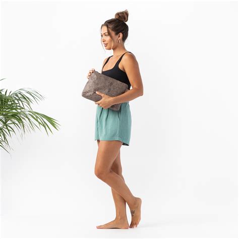 python mid pouch in espresso on black aloha collection aloha collection