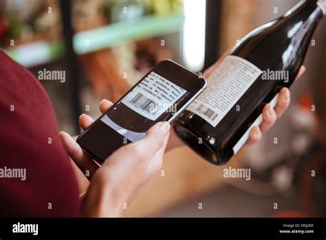 Woman Holding Bottle Reading Bar Code Hi Res Stock Photography And Images Alamy