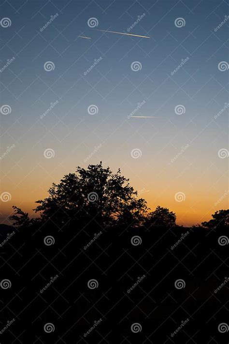 Three Planes Flying Overhead At Sunset Stock Image Image Of Colours