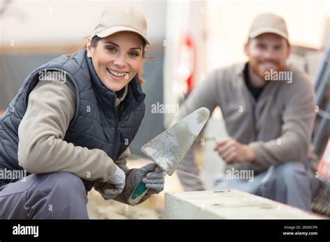Male Female Builders Builder On Building Site Stock Photo Alamy