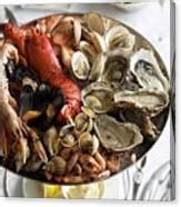 A Seafood Platter With Lobster Oysters Bread Butter And Mayonnaise