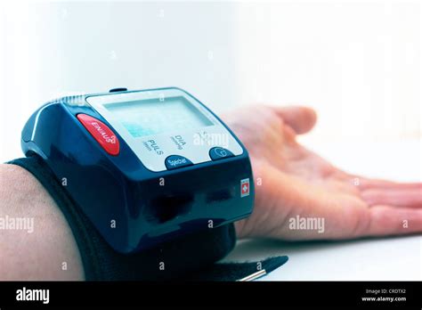 Digital Blood Pressure Meter For The Wrist Stock Photo Alamy