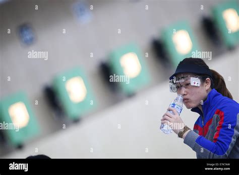 Incheon South Korea 20th Sep 2014 Guo Wenjun Of China Drinks Water During The Womens 10m