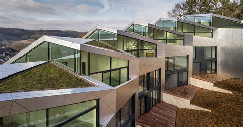 This Futuristic Metal Clad Residence Is Segmented Like A Lobster Tail