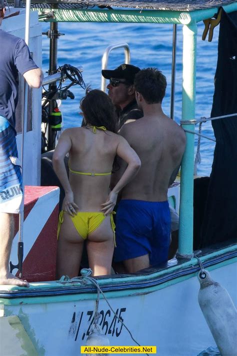 Dakota Johnson In Yellow Bikini On A Yacht