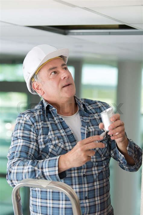 Installing The Spy Camera Stock Image Colourbox