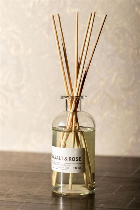 Premium Photo An Aroma Diffuser With Aromatic Oil And Sticks In The