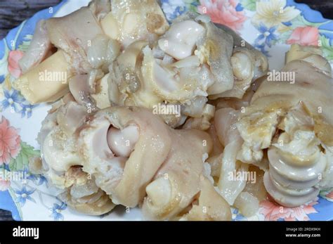 Arabic Egyptian Cuisine Of Kawareh Trotters With Its Traditional Soup