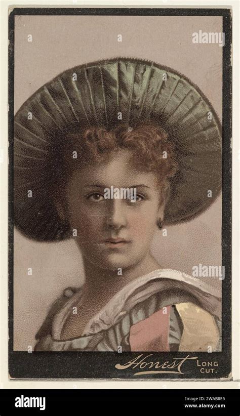 Actress Wearing Wide Brimmed Hat Lined With Green Folded Fabric From