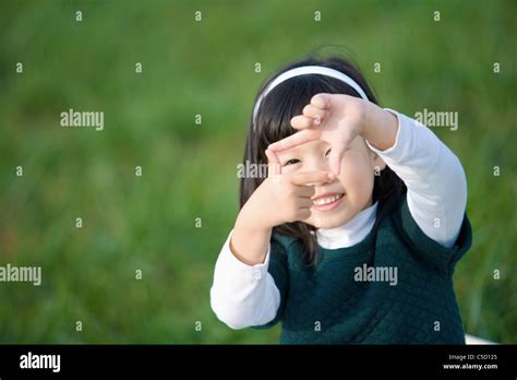Girl Making Frame By Using Her Hand Stock Photo Alamy