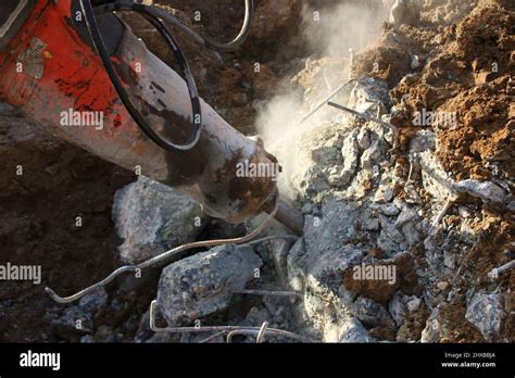 Excavator Chisels With A Chisel In An Excavation Stock Photo Alamy