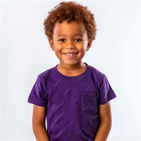 Premium Photo A Boy Wearing A Purple Shirt That Says He Is Smiling